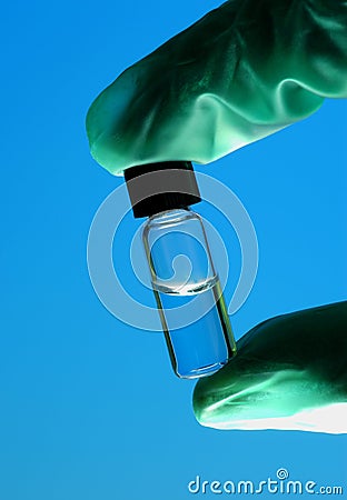 Hand Holding Vial Stock Photography | CartoonDealer.com #266786