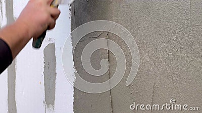 Hand with a Putty Knife, Apply the Putty To the Wall. Process of ...
