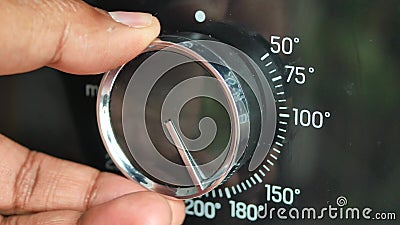 Hand Setting Temperature Control on Oven Closeup Stock Video - Video of ...