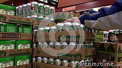 A Hand Takes Bottles of Heineken Beer Stock Footage - Video of shopper ...