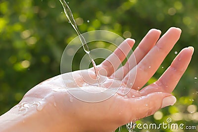 Water Pouring in Woman Hand with Icons Energy Sources for Renewable ...