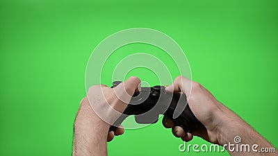 Hands Of Dedicated Young Gamer Using A Game Controller With Green ...