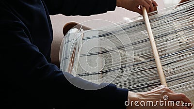 Hands are Making Black and White Striped Woven Cloth Using Weaving Loom ...