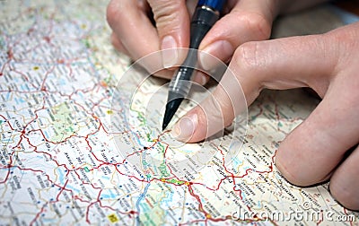 Hands On A Map Stock Image | CartoonDealer.com #13823887