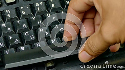 Hands Insert The Buttons Of The Keyboard Into The Groove On The Body ...