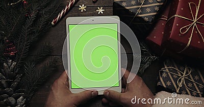Hands of Santa Claus Holding White Tablet Computer with Green Screen ...