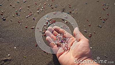 Hands with Small Particles of Microplastics and Polyethylene the ...