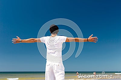 Handsome Man Standing In The Sun On Beach Stock Photography - Image ...