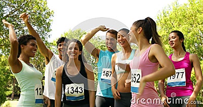 Happy Group of Friends Cheering after Running a Race Stock Footage ...