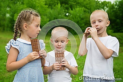 Happy Kids Eating Chocolate Royalty-Free Stock Photography ...