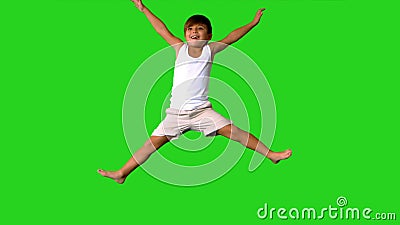Happy Little Boy Jumping on Green Screen Stock Footage - Video of happy ...