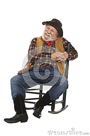 Happy Old Cowboy Sits In Rocking Chair Stock Images - Image: 26845104