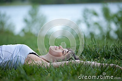 Happy Young Woman Lying In Field Stock Image - Image: 15863021