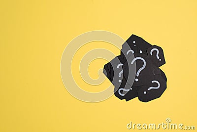 Heap Of Black Paper Card With QUESTION MARK On Bright Yellow Background ...