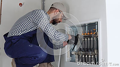 Heating Engineer Installing Modern Heating System in Boiler Room Stock ...