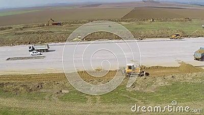Heavy Construction Equipment Working on an Airport Runway Stock Video ...