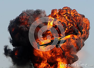Helicopter And Giant Explosion Stock Photo - Image: 13194880
