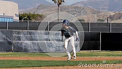 High School Baseball Player at Second Base Ready To Run the Bases Stock ...