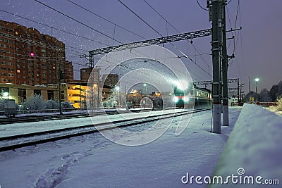 High-speed Passenger Electric Train At Night. A Beam Of Train Spotlight ...