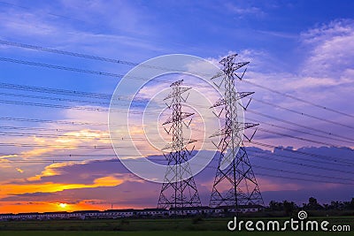 High Voltage Post Tower And Power Line On Sunset Sky Background Stock ...