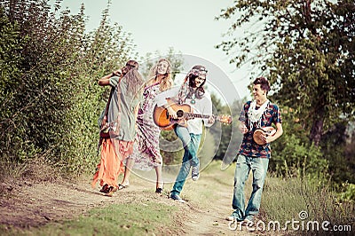 Hippie Group Dancing In The Countryside Stock Photos - Image: 26517773