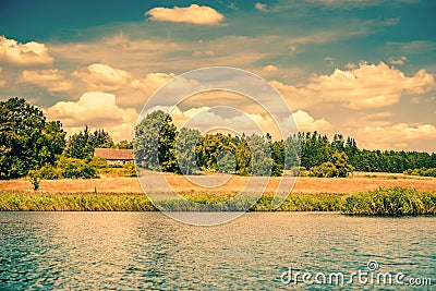 House By A Riverside Stock Image | CartoonDealer.com #43560343