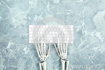 Human Skeleton Using Computer Keyboard At Grey Marble Table Stock Photo ...