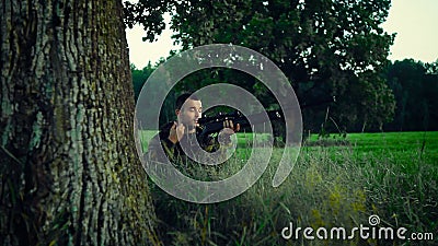 Hunter Sitting Under a Tree and Aim at Prey Stock Footage - Video of ...
