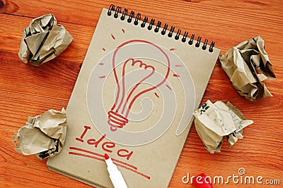 Idea Concept. Light Bulb As Symbol Of Creativity. Success And Sheets Of ...