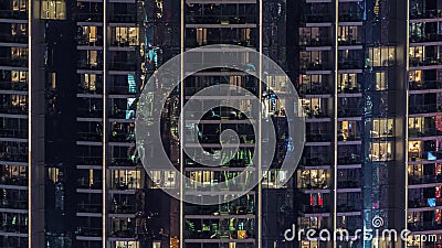 Windows in Apartments of a High Class Building at Night Timelapse Stock ...