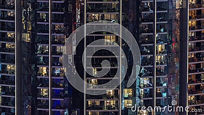 Windows in Apartments of a High Class Building at Night Timelapse Stock ...