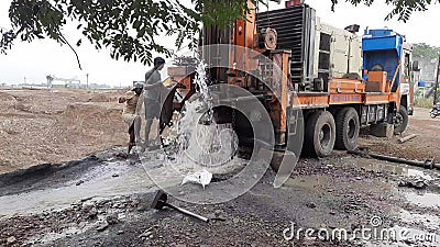 Indian Labour Extracting Borewell Water by Drilling Underground - Water ...