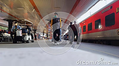 Indian Passenger Train Standing at Station with Passenger Walking at ...