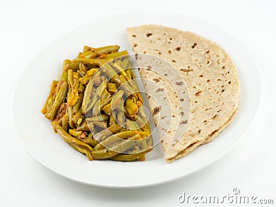 Indian Roti And Green Bean Sabzi On White Background Stock Photos ...