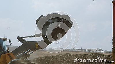 Industrial Compost Production Site. Tractors Loading Compost into ...