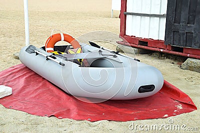 Inflatable Rescue Boat. Gray Inflatable Boat On The Beach In The ...