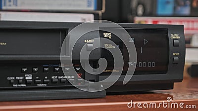 Insert VHS Cassette into VCR and Push Play Button Stock Footage - Video ...