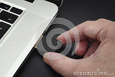 Inserting SD Card Into A Laptop Computer Stock Photo - Image: 53698977