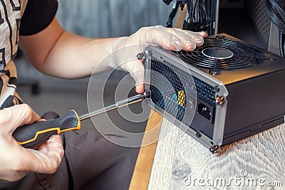 Installing Power Supply Unit Into The Desktop PC System Unit. Stock ...