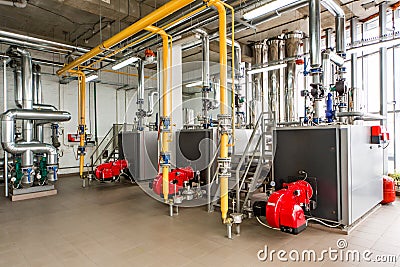 The interior of gas boiler, with three boilers. - Stock Image - Everypixel