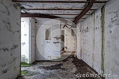 The Interior Hallway Of An Abandoned Military Bunker With Ceiling Rails ...