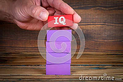 IQ Test Concept. Colorful Blocks On A Wooden Texture Background Stock ...
