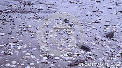 Iron Scissors Fall on the Wet Sand from the Beach Stock Video - Video ...