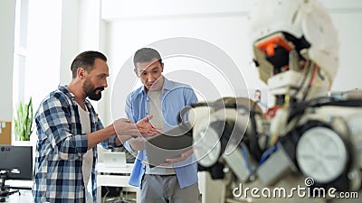 Irritated Engineers Arguing about Robot Construction Stock Footage ...