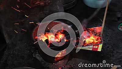 Java, Indonesia 06182022-hot Coals are Moved from Fire To Scoop Stock ...
