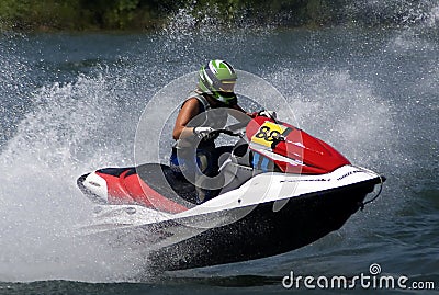 Man on a High Speed Jet Ski Stock Photo - Image of moving, lifestyle ...