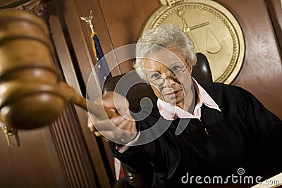 Judge Pointing Gavel In Courtroom Stock Photos - Image: 29663143