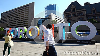 4K UltraHD People with Large Letters Spelling Toronto Stock Footage ...