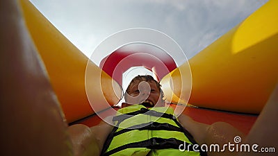 A Kid Slides Down the Waterslide on His Back Stock Footage - Video of ...