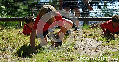 Kids Crawling Under the Net during Obstacle Course Training Stock ...